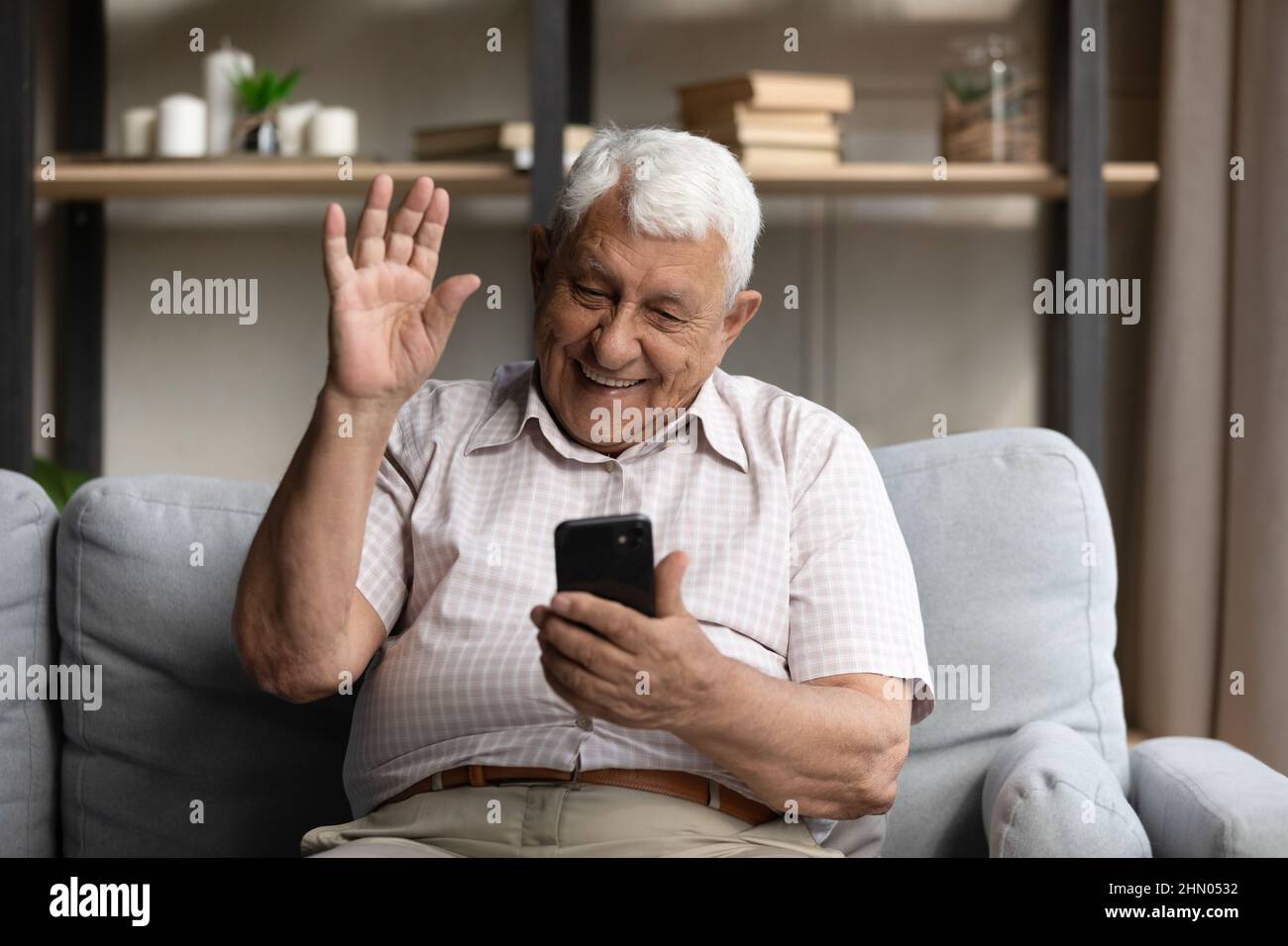 Old man speaking on phone hi-res stock photography and images - Alamy
