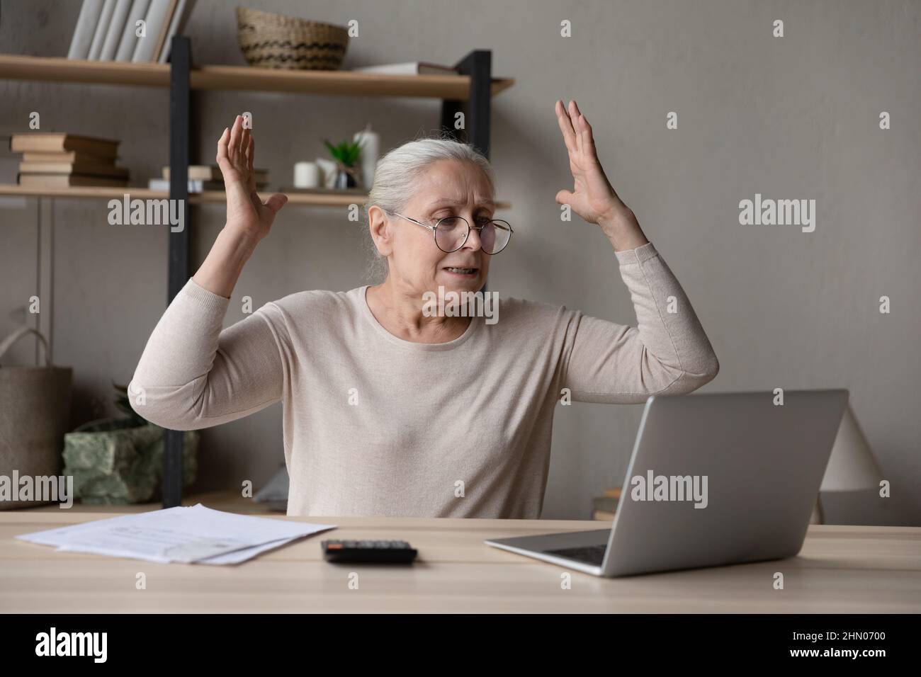 Older woman upset computer home hi-res stock photography and images - Alamy