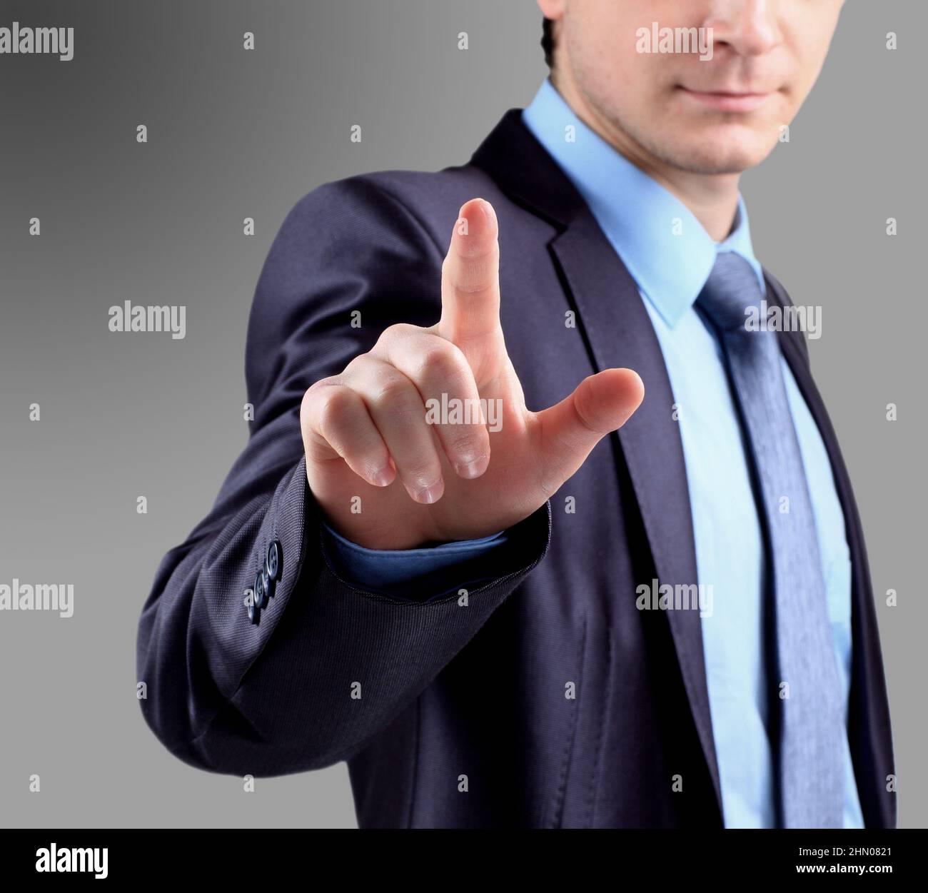 Business Man pushing on a touch screen interface Stock Photo - Alamy
