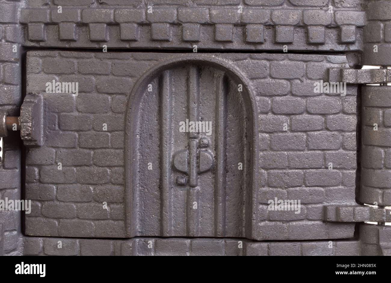 Cast iron door for furnaces. Fragment. Close up Stock Photo - Alamy