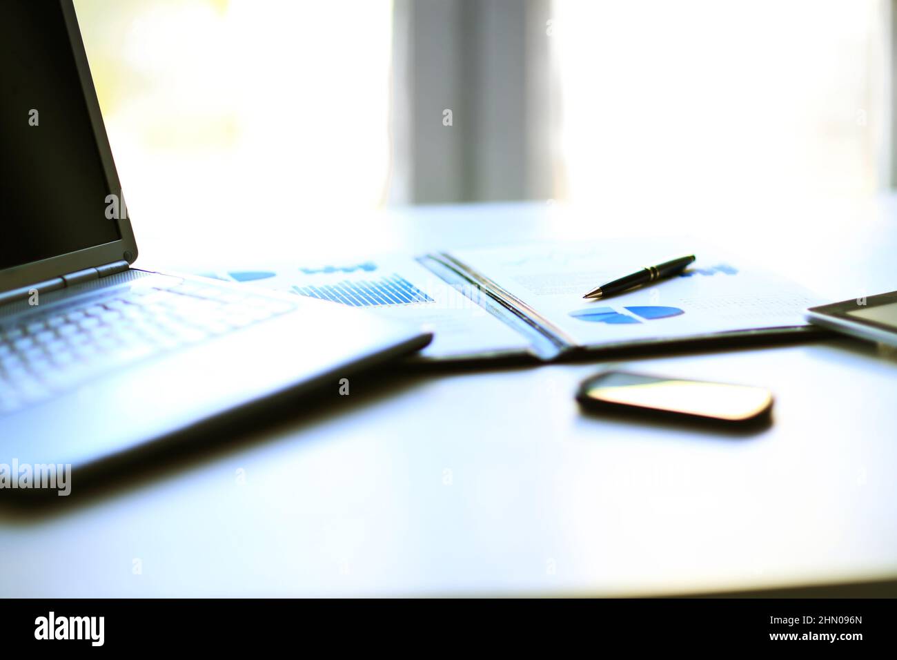Working, analyzing graphics and doing calculations Stock Photo - Alamy Working, analyzing graphics and doing calculations Stock Photo - Alamy