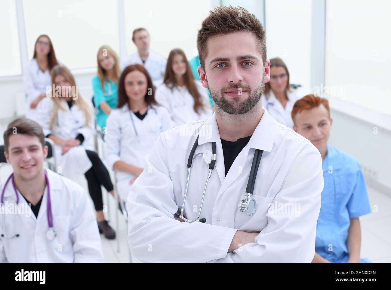 top view. a group of smiling doctors pointing at you Stock Photo - Alamy