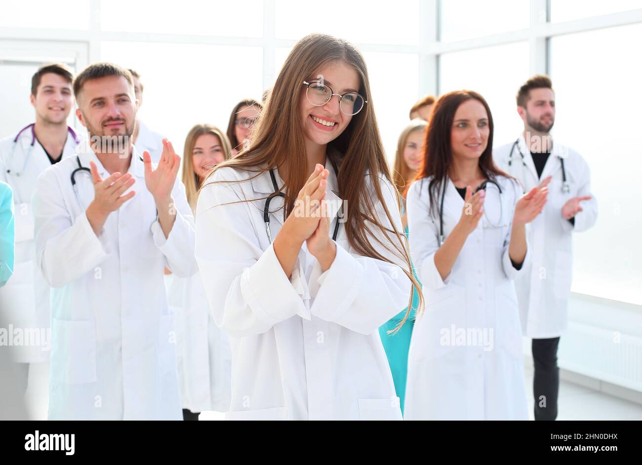 side view . pretty young woman looking forward Stock Photo - Alamy