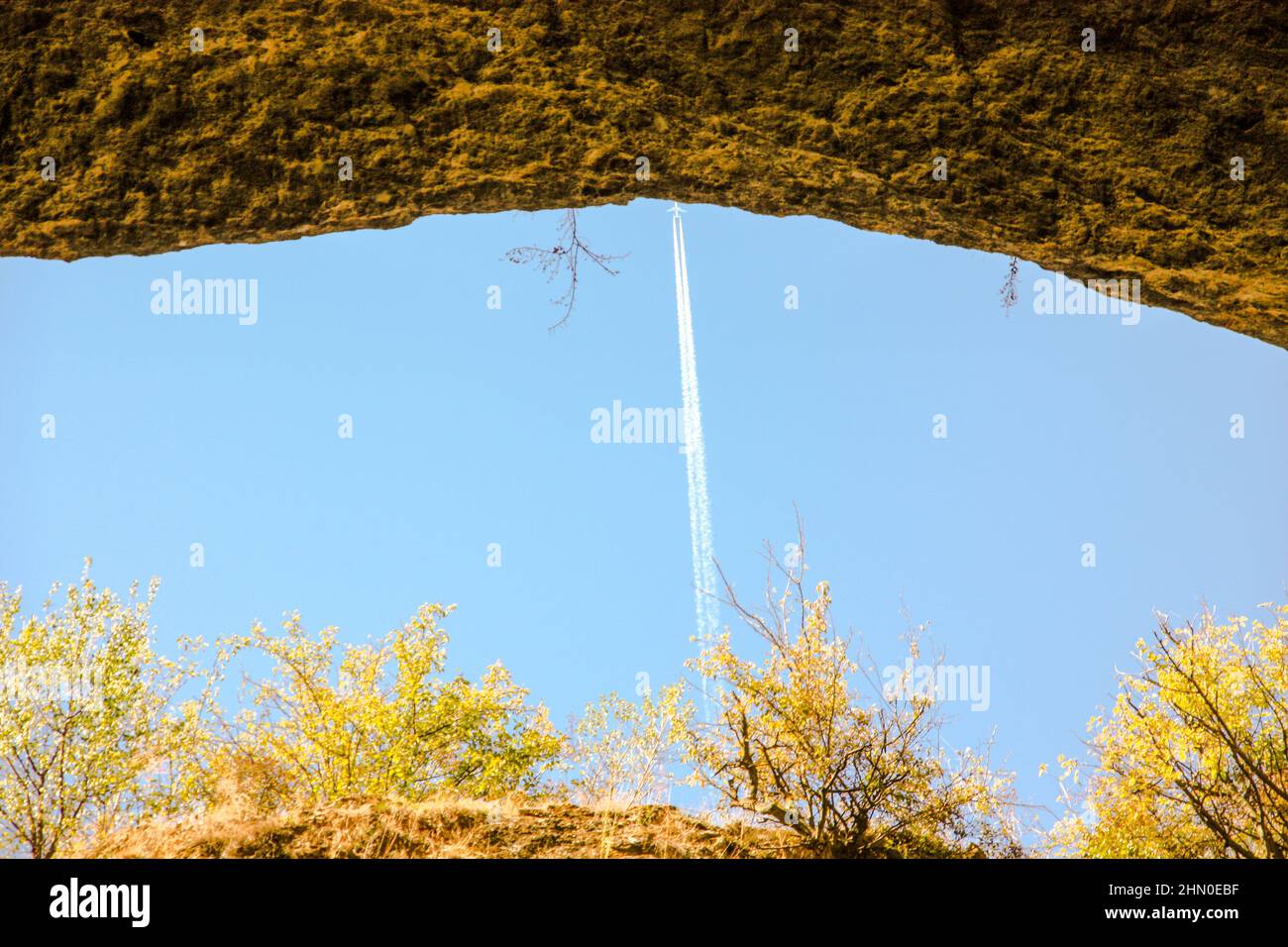 Beautiful shot of a cave in a forest during the day Stock Photo - Alamy