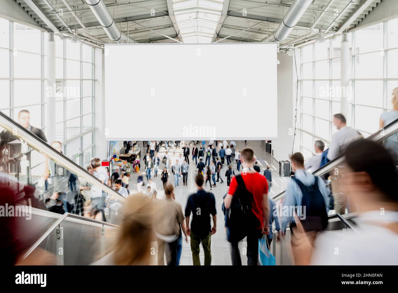 White illuminated advertising as a mock-up in trade fair Stock Photo ...