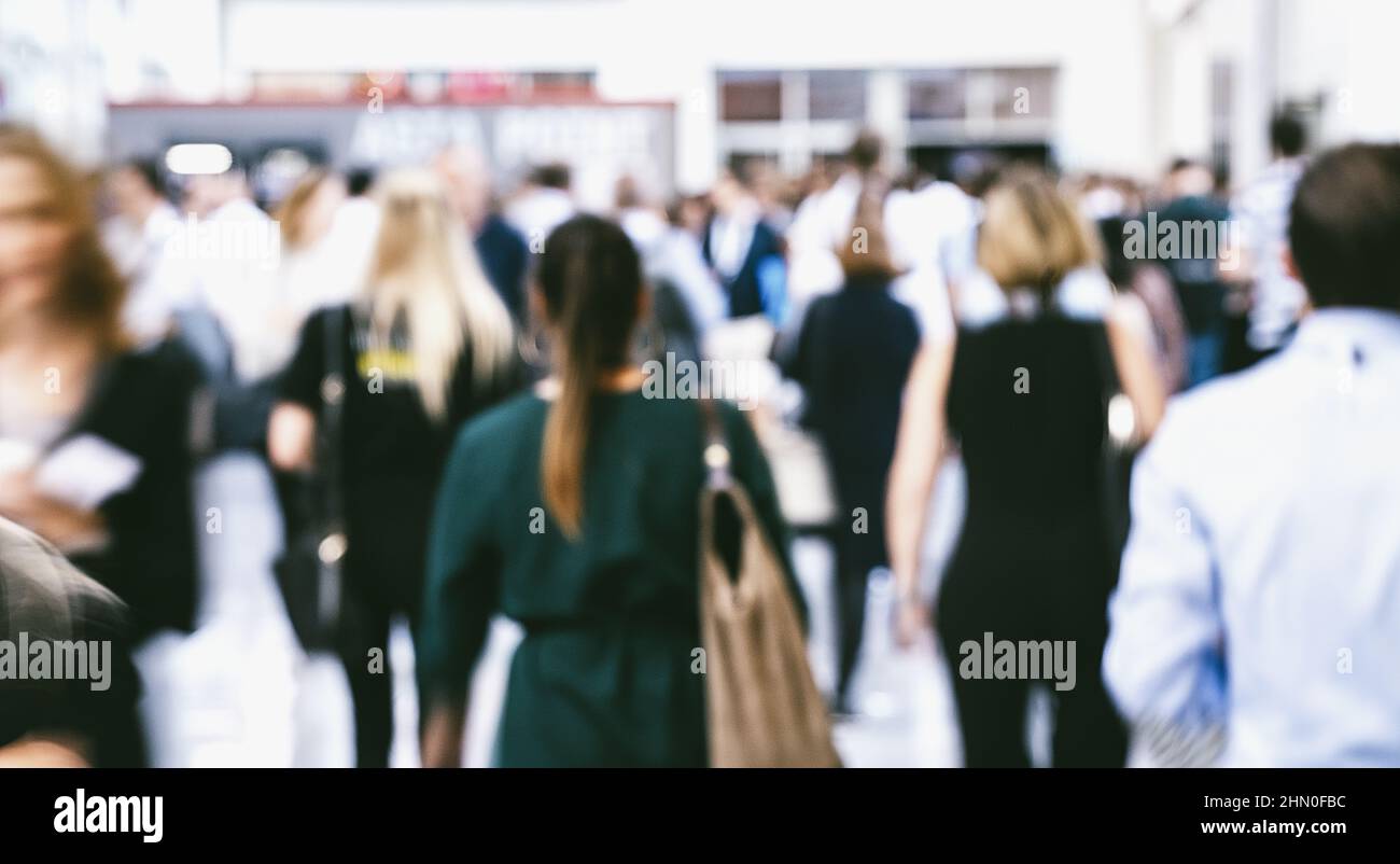 Anonymous crowd of people goes in the city of london - Defocused photo ...