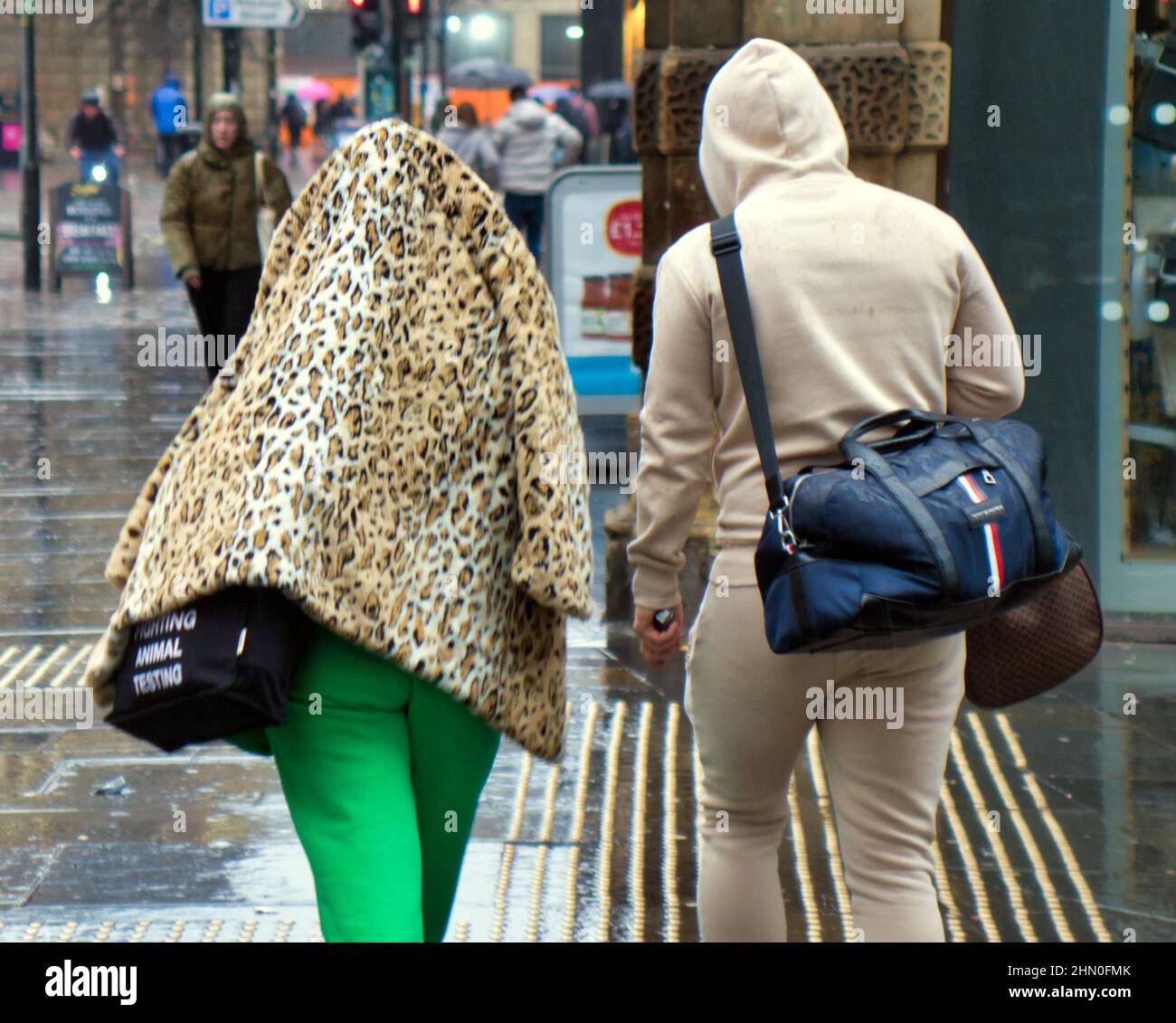 Homeless man with umbrella hi-res stock photography and images - Alamy