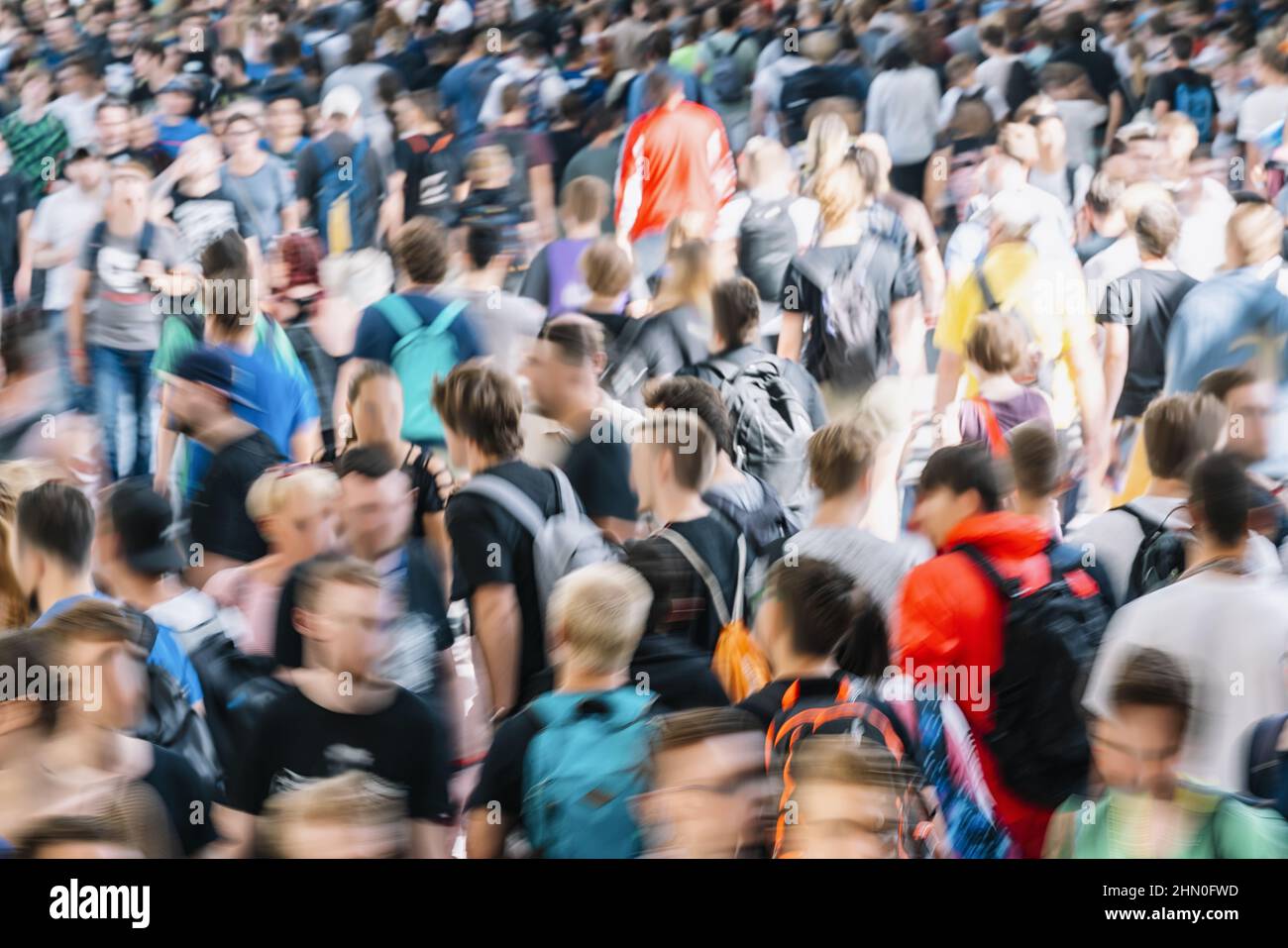 Crowd of people walking in a hall Stock Photo - Alamy