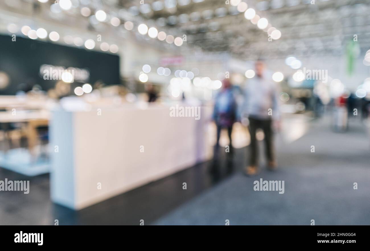 Abstract people in a trade show hall event background usage Stock Photo ...