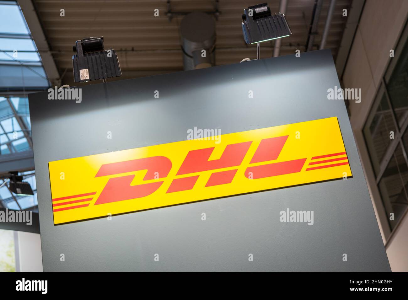 Logo of DHL on a trade show booth. DHL is a division of the German ...