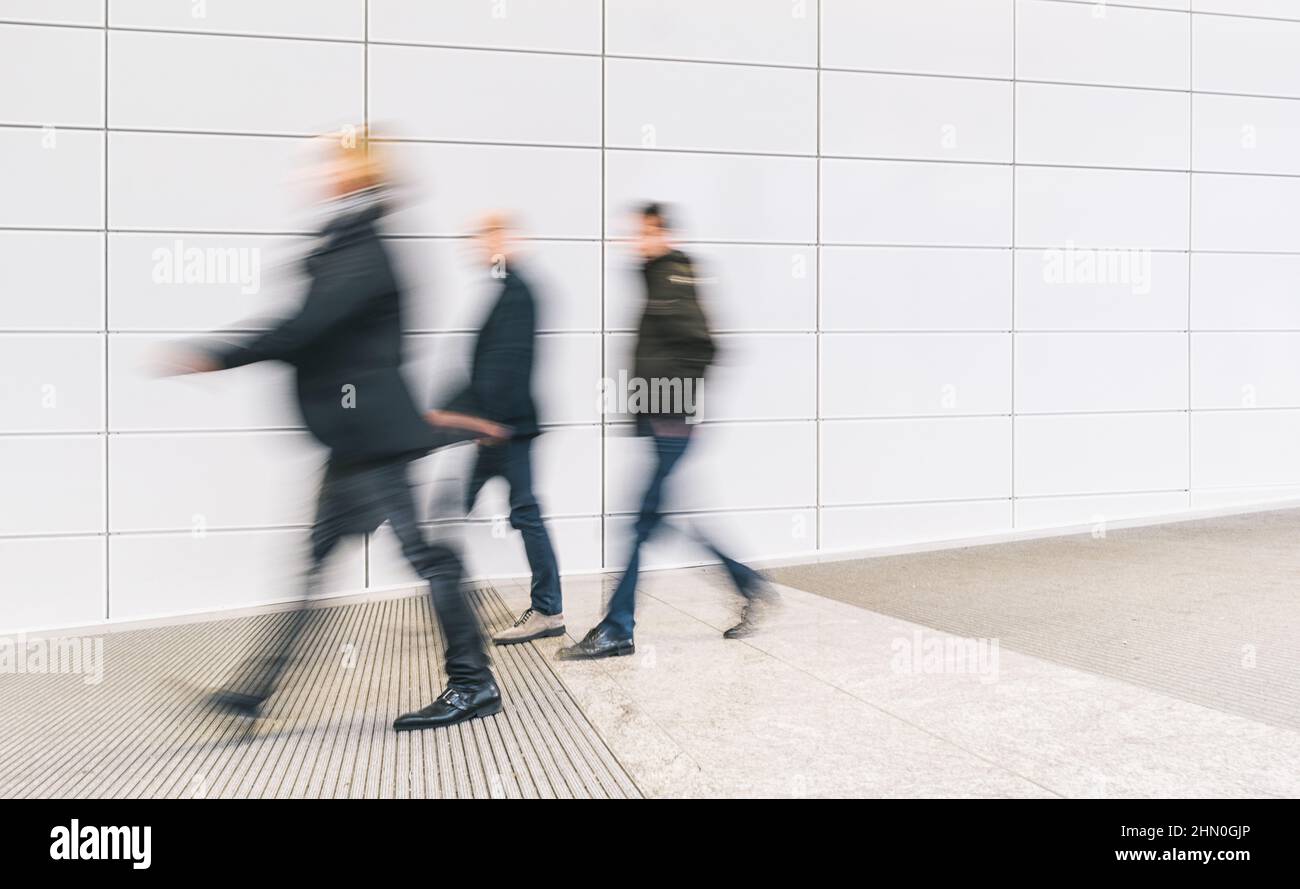 blurred people walking in a corridor Stock Photo - Alamy