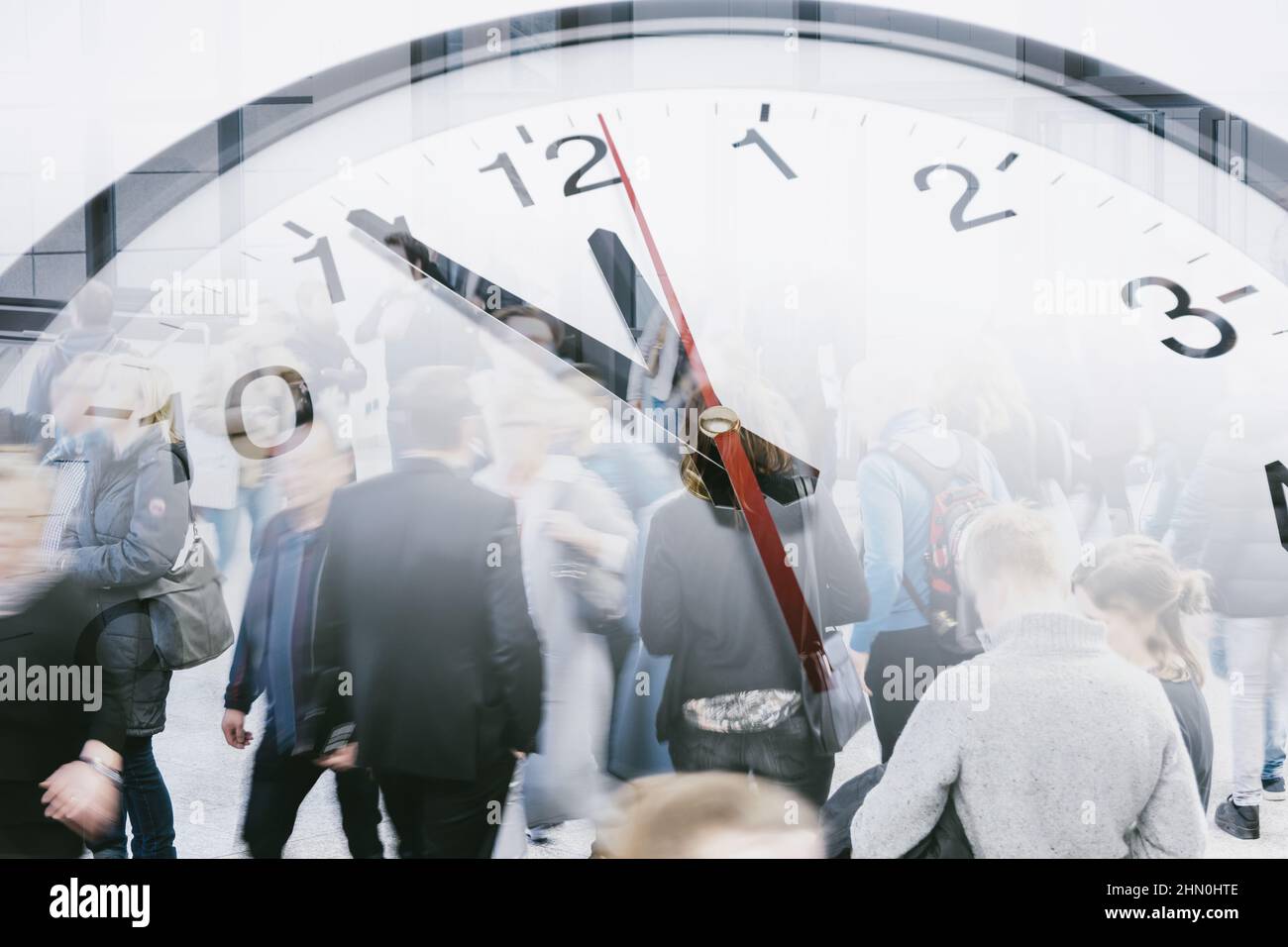 Business times concept people walking overlay with time clock Stock ...
