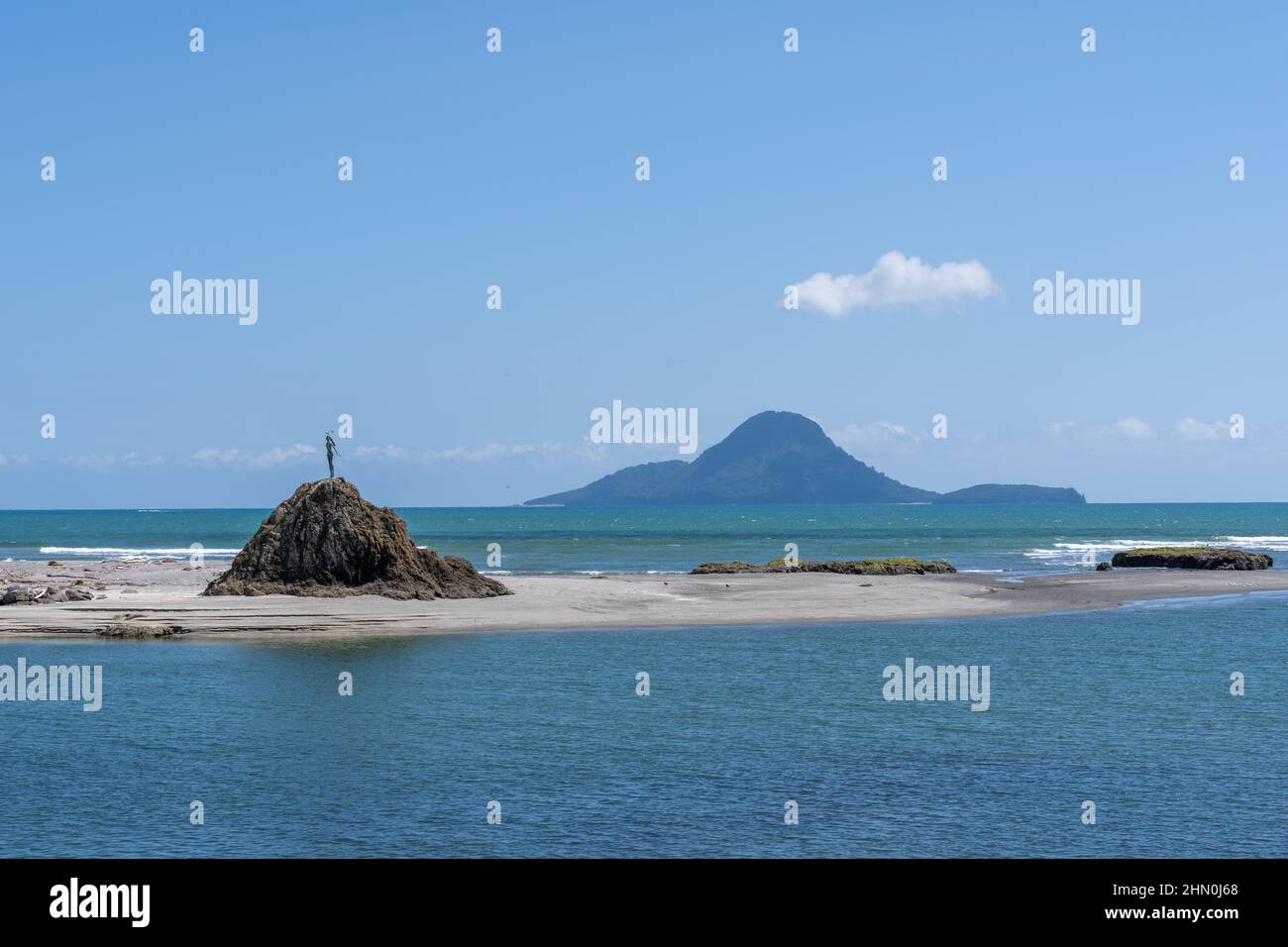 Whale Island off coast of Whakatane with Lady on Rock statue in harbour ...