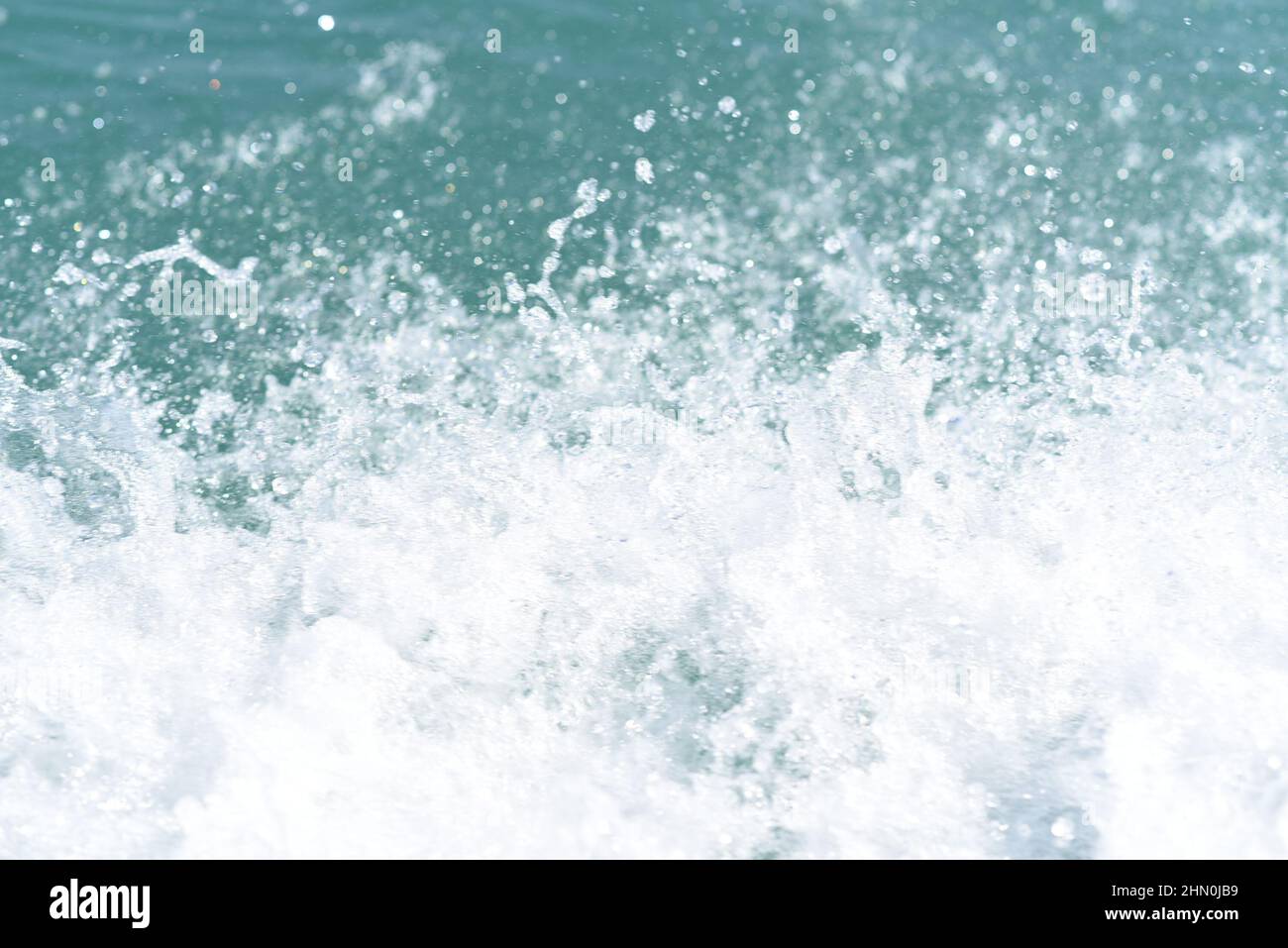 Blue bubbling water of mountain river. Ocean tide of turquoise sea ...