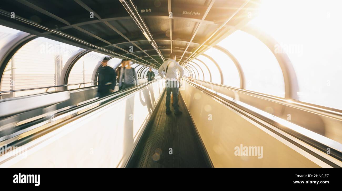 passenger rushing through an escalator in airport terminal Stock Photo ...