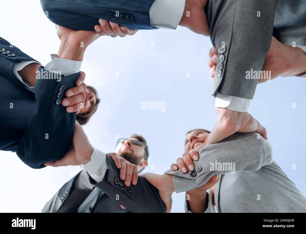 business team are taking each other's hands Stock Photo - Alamy