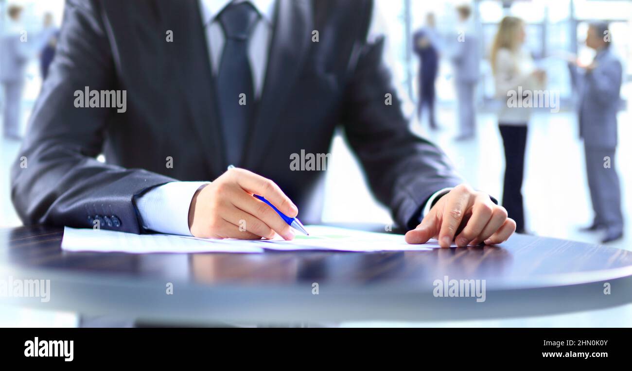 Closeup of human hand writing on a paper Stock Photo - Alamy