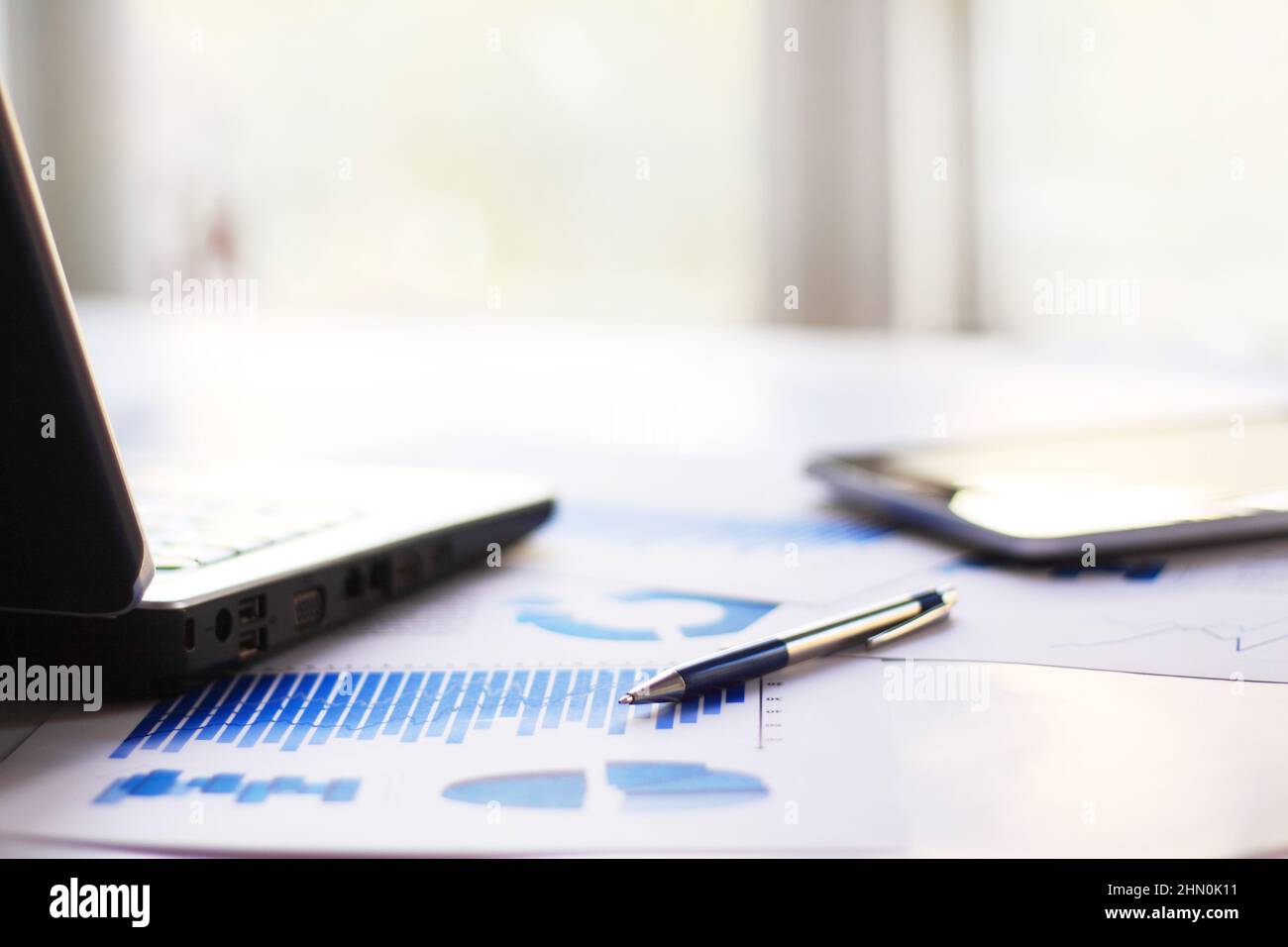Working, analyzing graphics and doing calculations Stock Photo - Alamy Working, analyzing graphics and doing calculations Stock Photo - Alamy