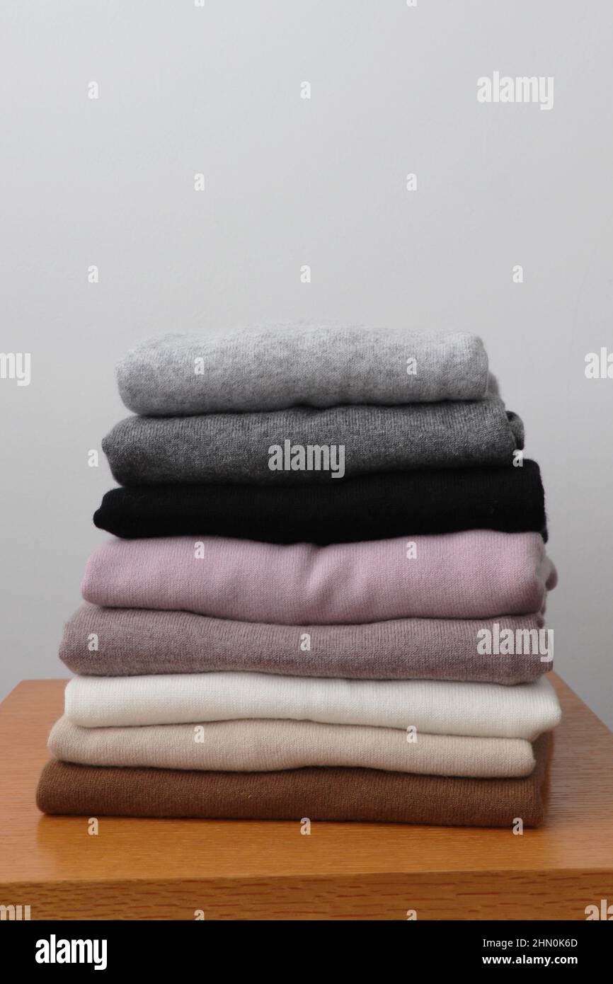 Pile or stack of colorful, folded cashmere or merino wool jumpers Stock ...