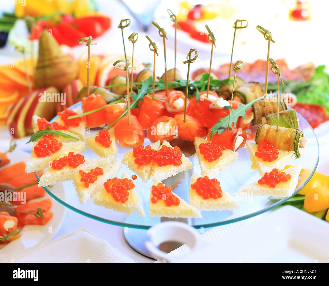 catering table set service with silverware and glass stemware at ...