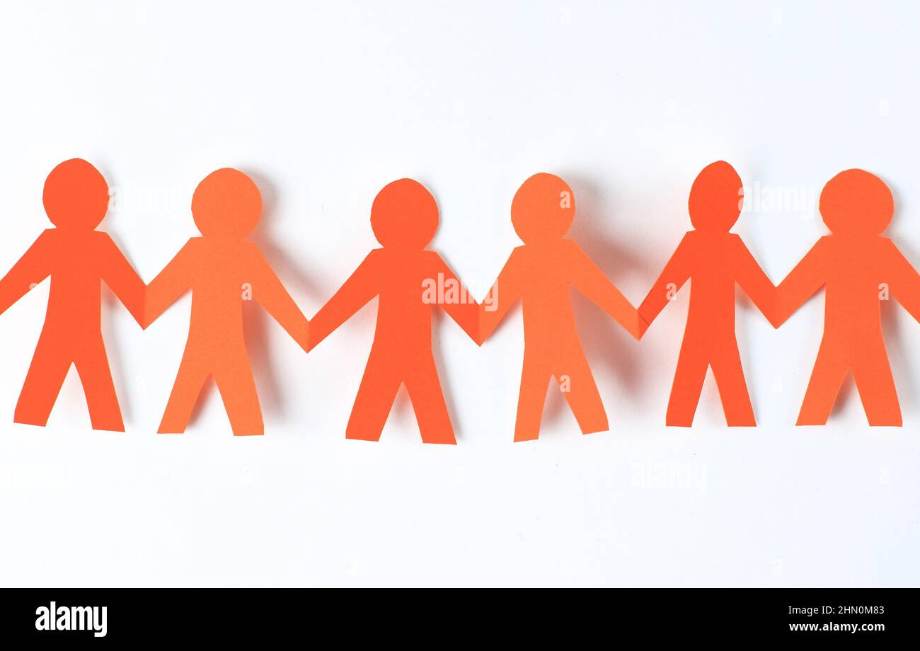 teamwork, paper people over white background Stock Photo - Alamy