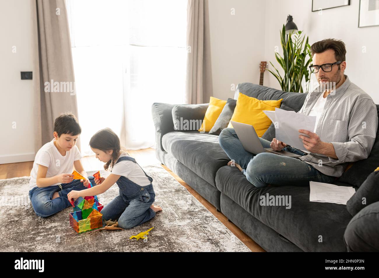 Father home alone hi-res stock photography and images - Alamy