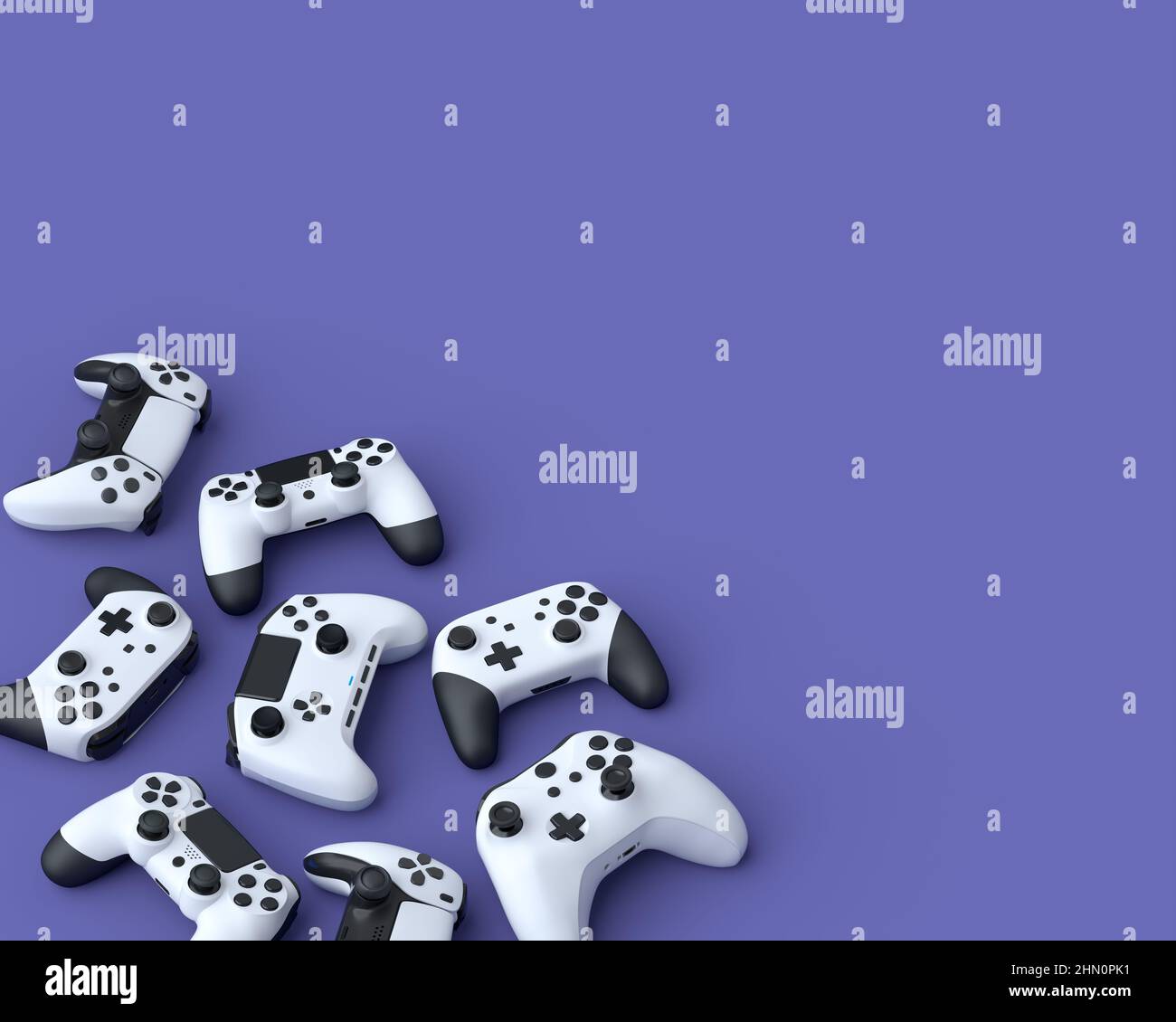 Set of lying gamer joysticks or gamepads on purple background with blur ...