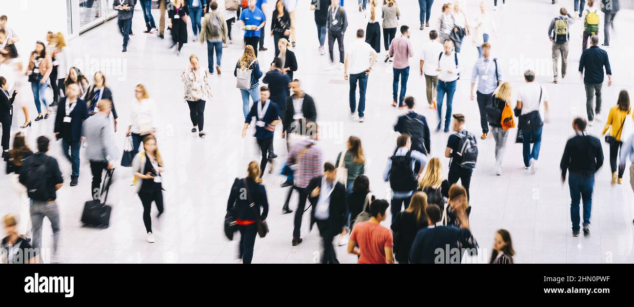 Many anonymous people on the way to Mass in london Stock Photo - Alamy