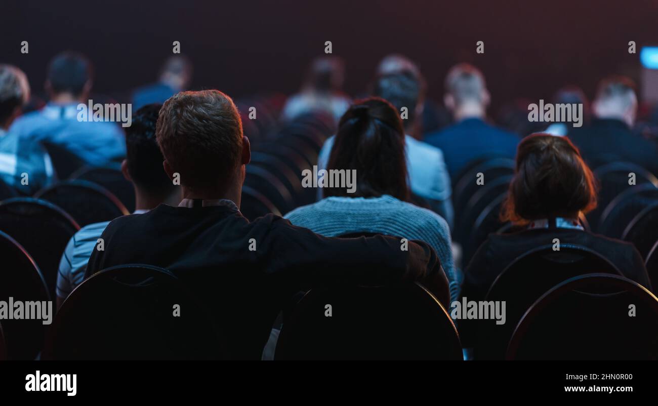 Rear view of Audience in the conference hall or seminar meeting ...