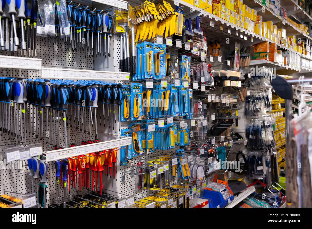 Construction work tools on stand Stock Photo - Alamy