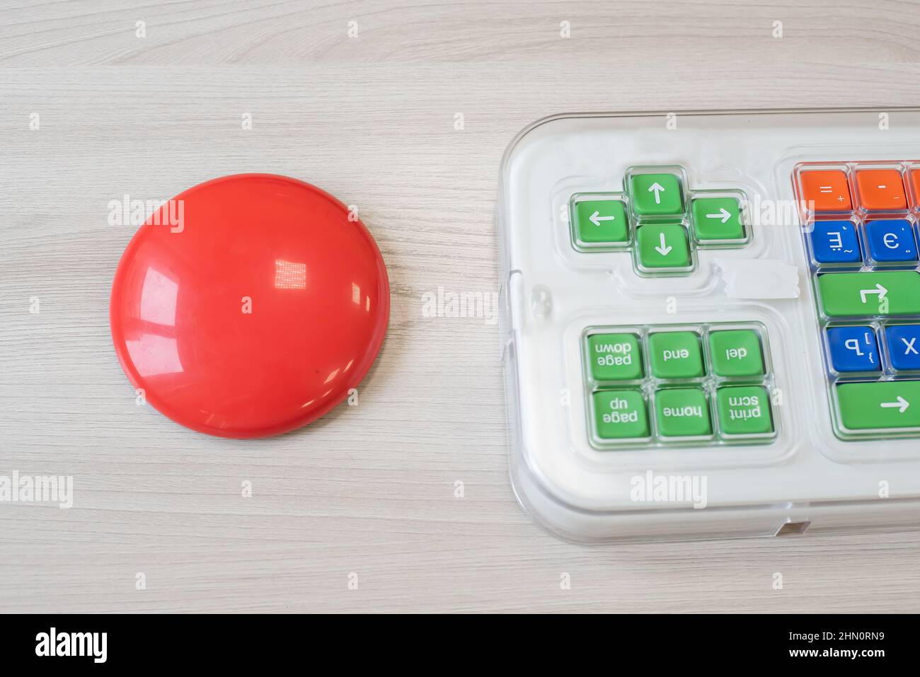 Woman with cerebral palsy working on a specialized wireless computer ...