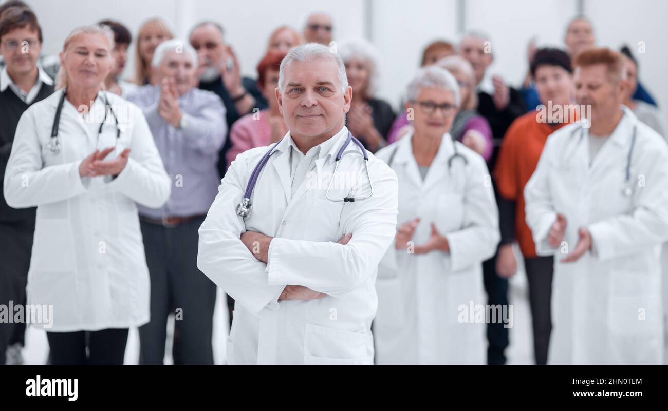 Group doctors and patients clapping their hands to celebrate recovery ...