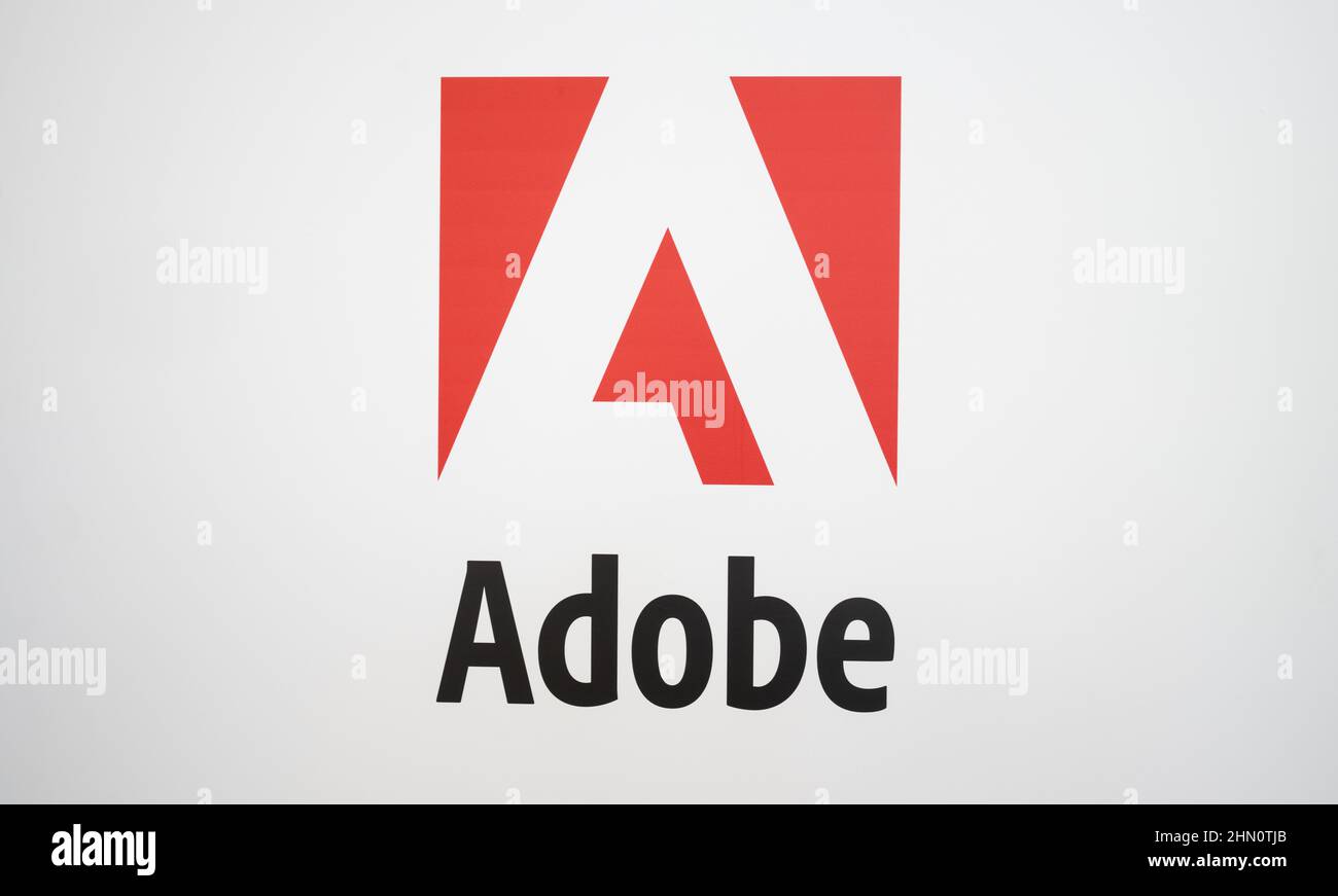 Adobe Systems Logo on white. Adobe is a multinational software company ...