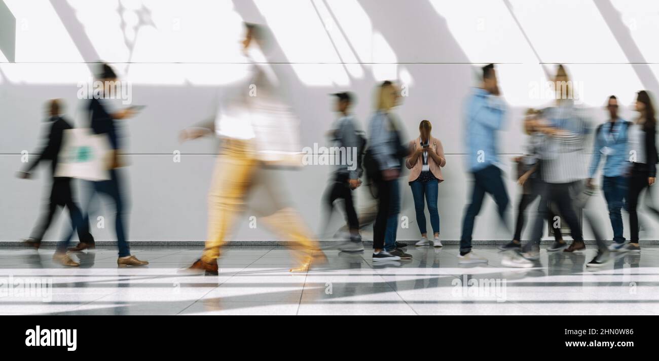 Many hectic people in pedestrian area of a city Stock Photo - Alamy