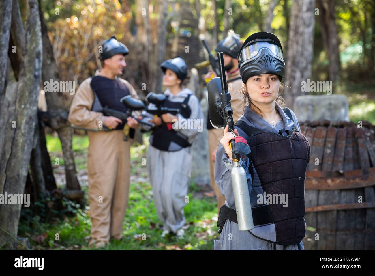 Portrait of girl at paintball shooting range Stock Photo - Alamy