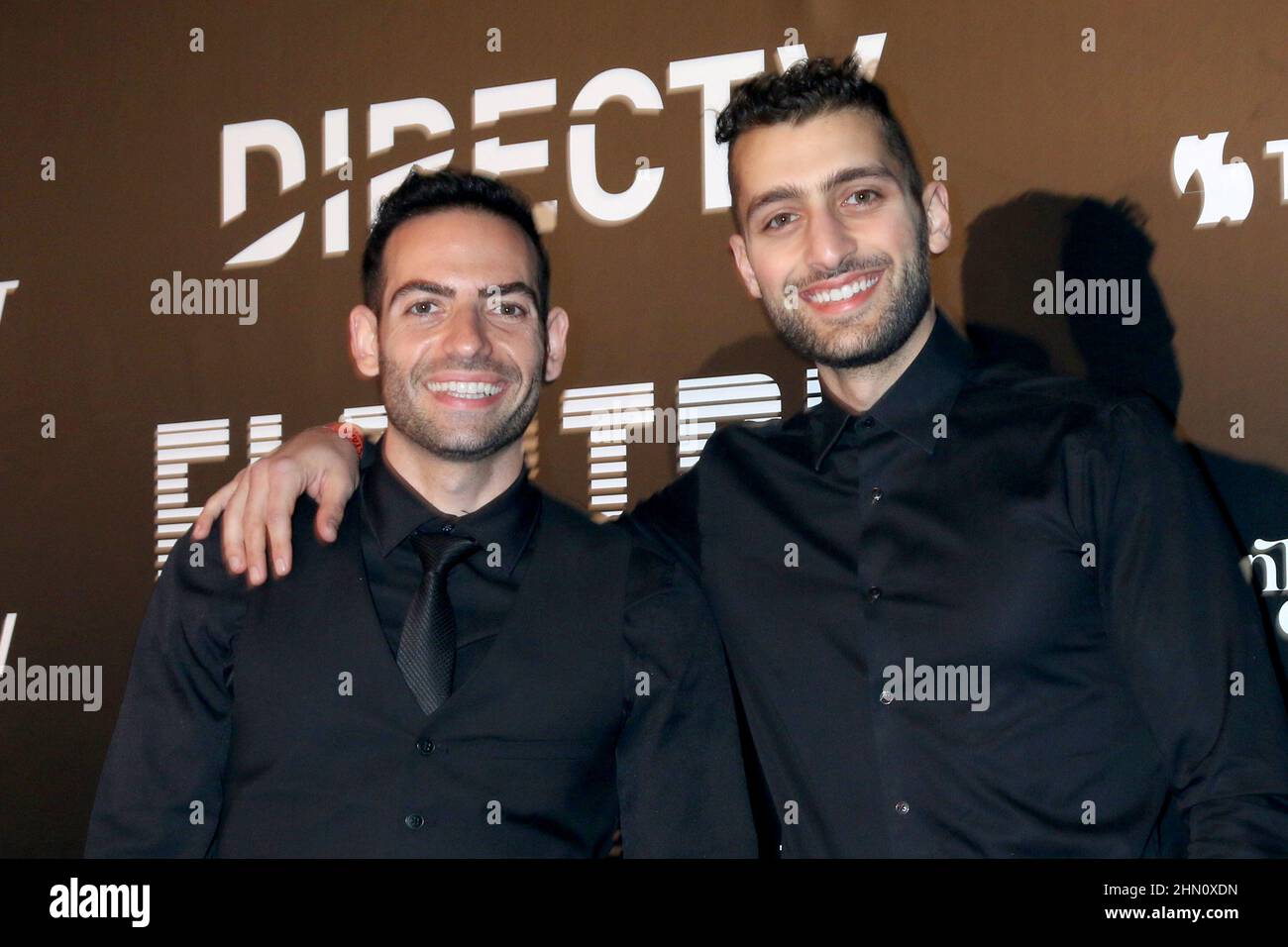 LOS ANGELES - FEB 12: Jerry Gregorio, Lee Petropoulas at the DIRECTV ...