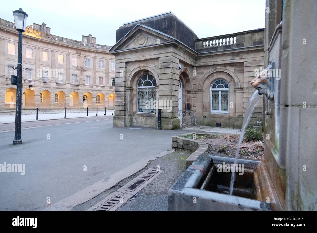 Drinkable Buxton spring water emanating from lion's head fountain at St ...