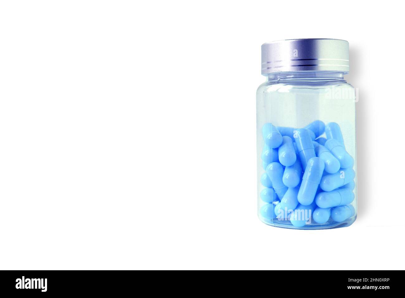 medicine or supplement capsules in transparent plastic bottle isolated ...