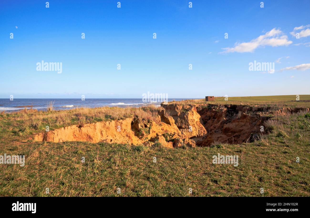 Gaping hole in the cliffs caused by water runoff and seepage on the ...
