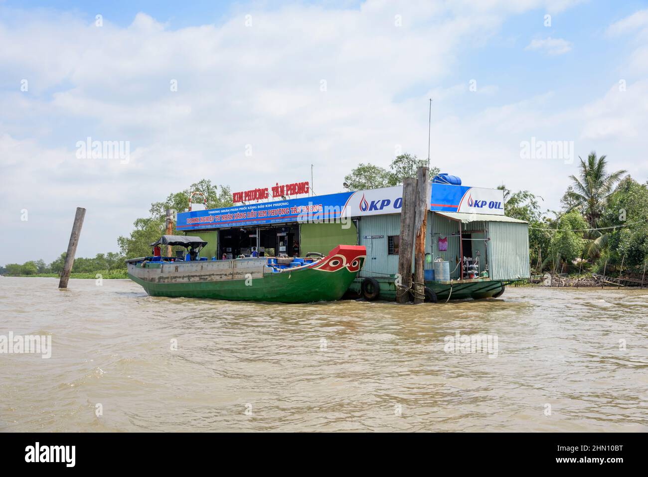 Floating petrol station servicing river boats, Mekong Delta, Vinh Long ...