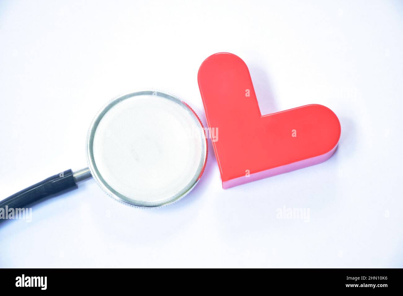 red heart and stethoscope medical equipment for doctor listening pulse ...