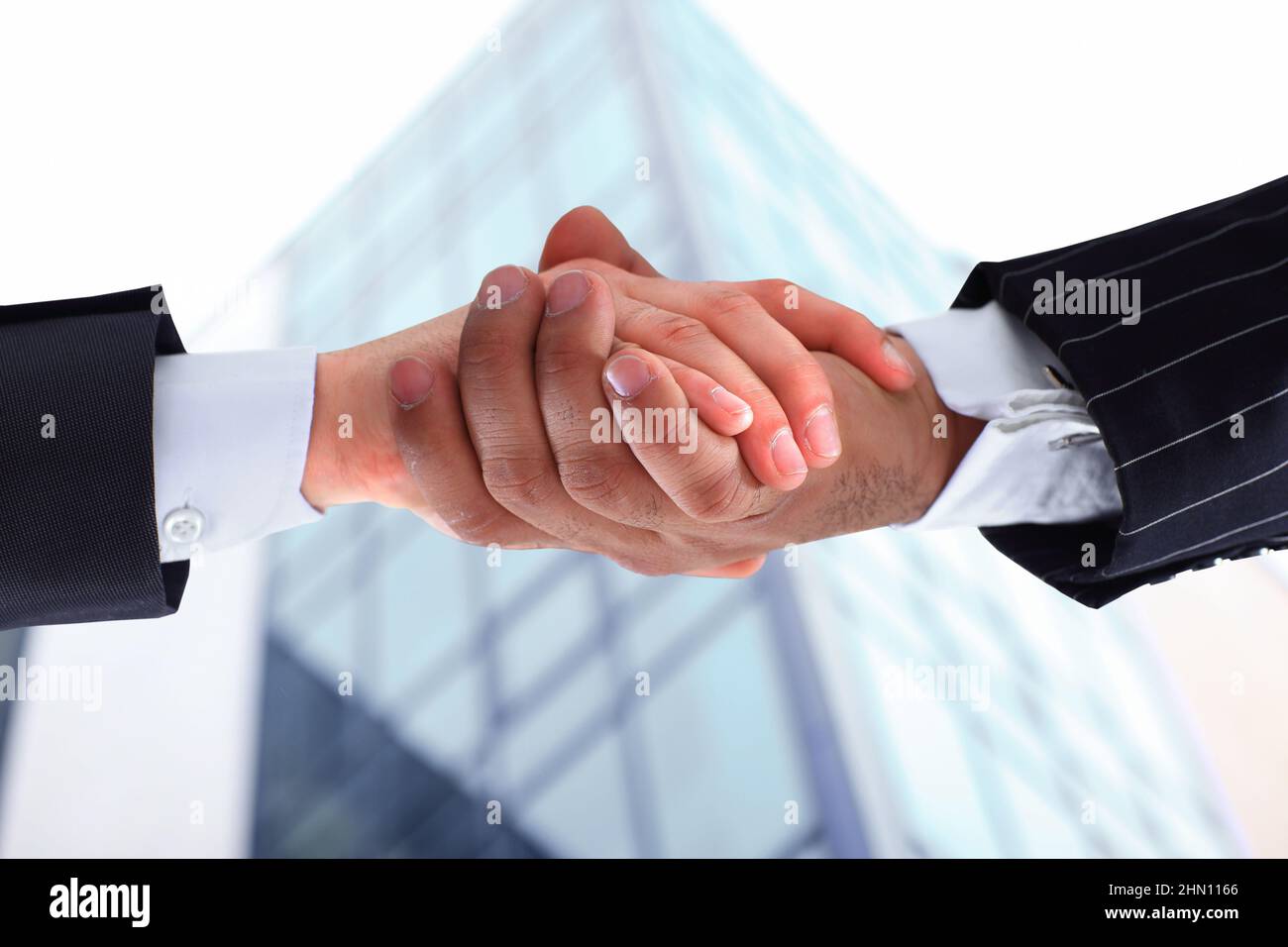 The conclusion of the transaction. Handshake Stock Photo - Alamy