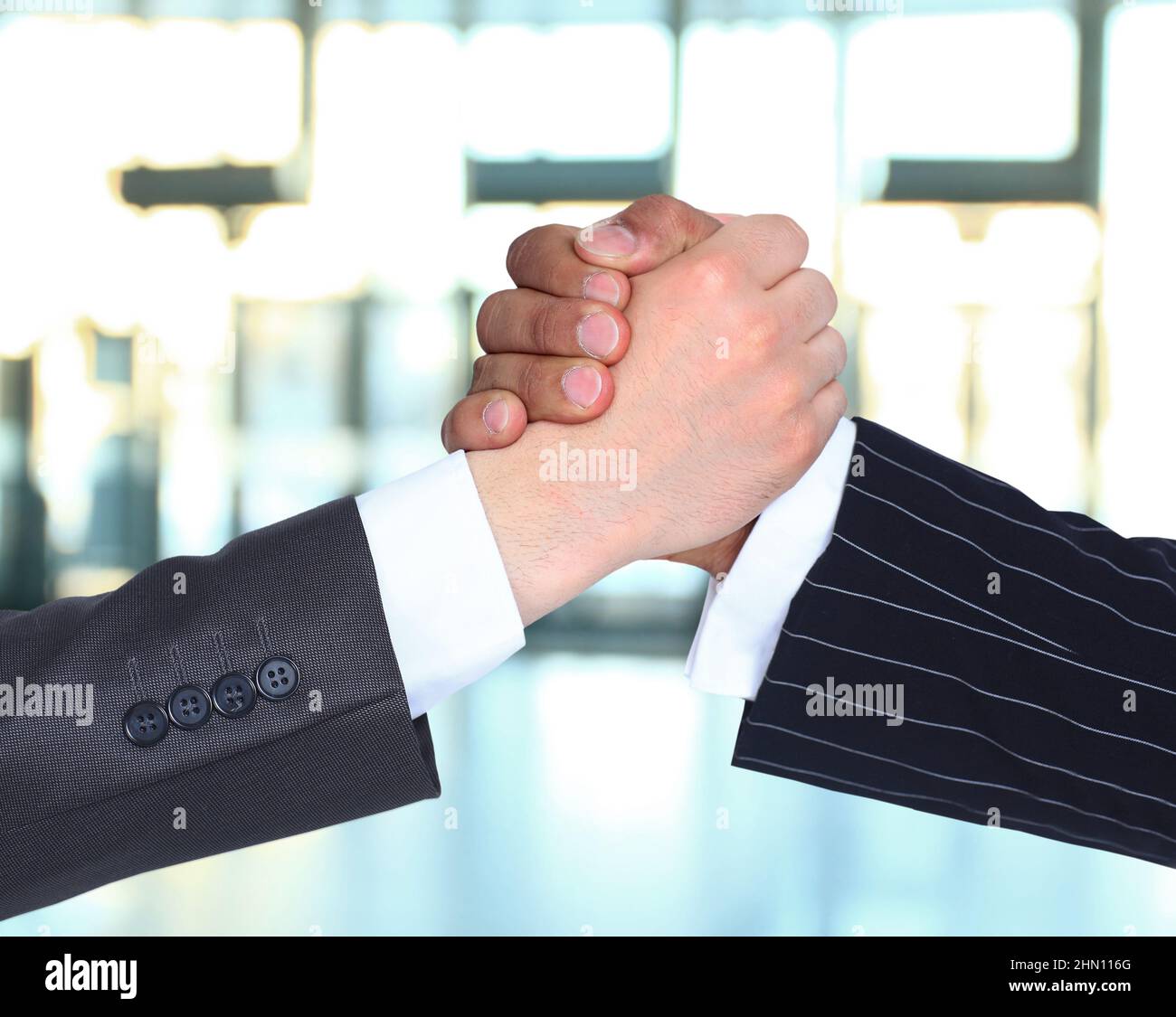 The conclusion of the transaction. Handshake Stock Photo - Alamy