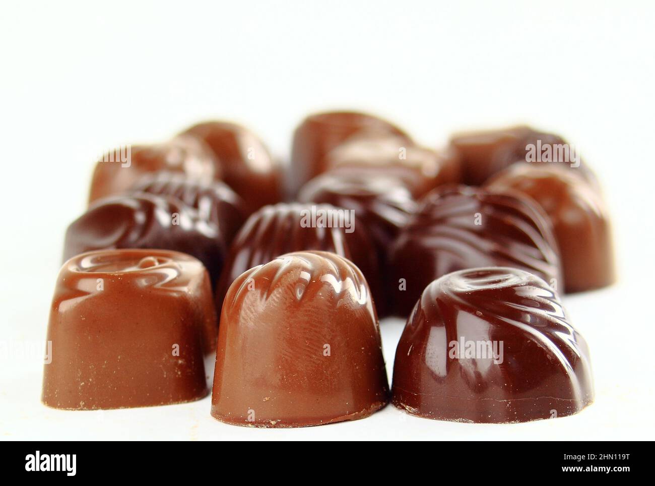 Closeup brown chocolate candy background Stock Photo - Alamy