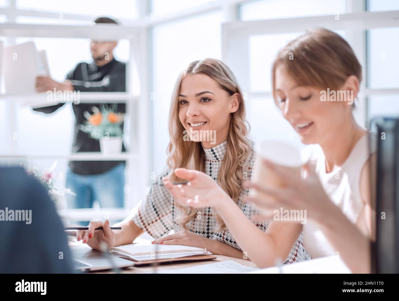 business people discuss something standing in the office Stock Photo ...