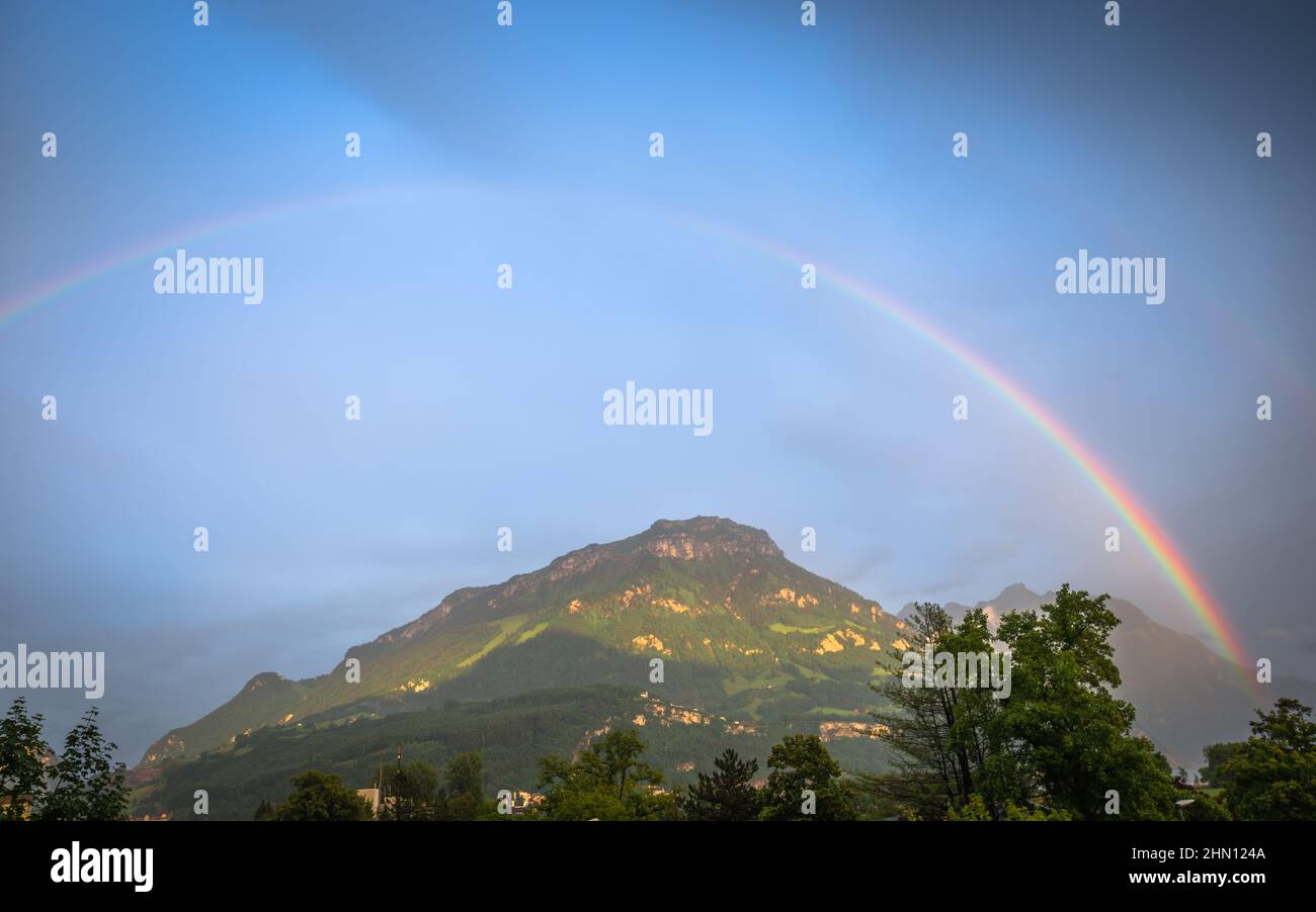 Double rainbow over the mountains. Switzerland. Alps Stock Photo - Alamy