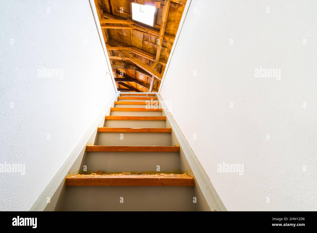 Stairs up to the attic of the house. Symbol of movement to the light ...