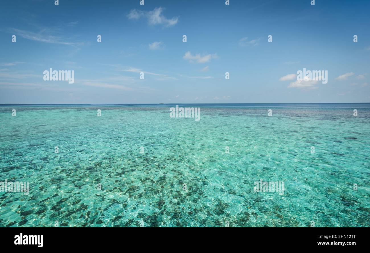 Turquoise lagoon of a tropical island. Maldives Stock Photo - Alamy