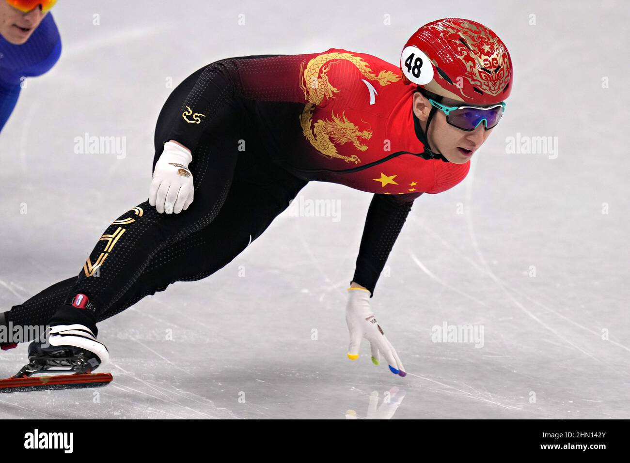 Beijing, China. 13th Feb, 2022. Dajing Wu of China, #48, ahead on the ...