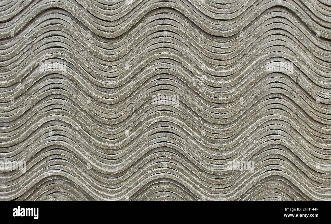 Construction asbestos-cement slate in a stack as background Stock Photo ...